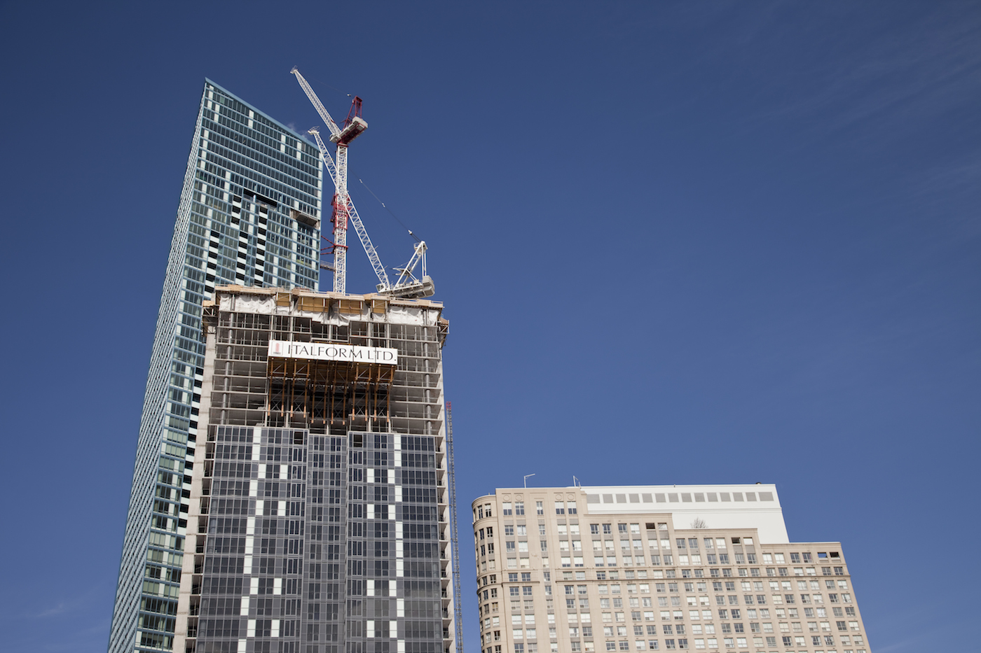 Backstage On The Esplanade Approaching Final Height | UrbanToronto