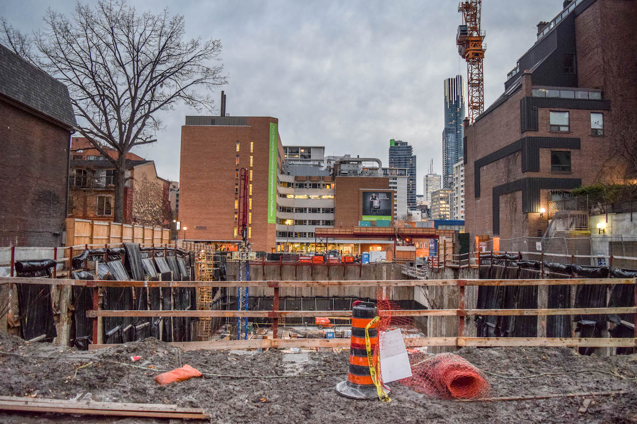 Crane Base Installed at Plaza's 50 at Wellesley Station | UrbanToronto