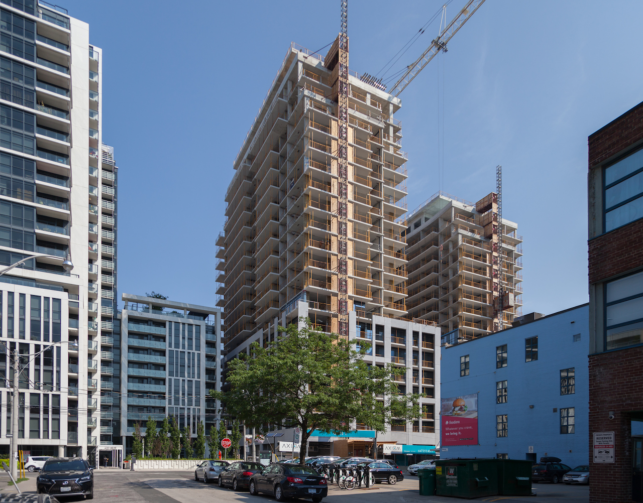 Cladding Progressing at Topped-Out Axiom Condos | UrbanToronto