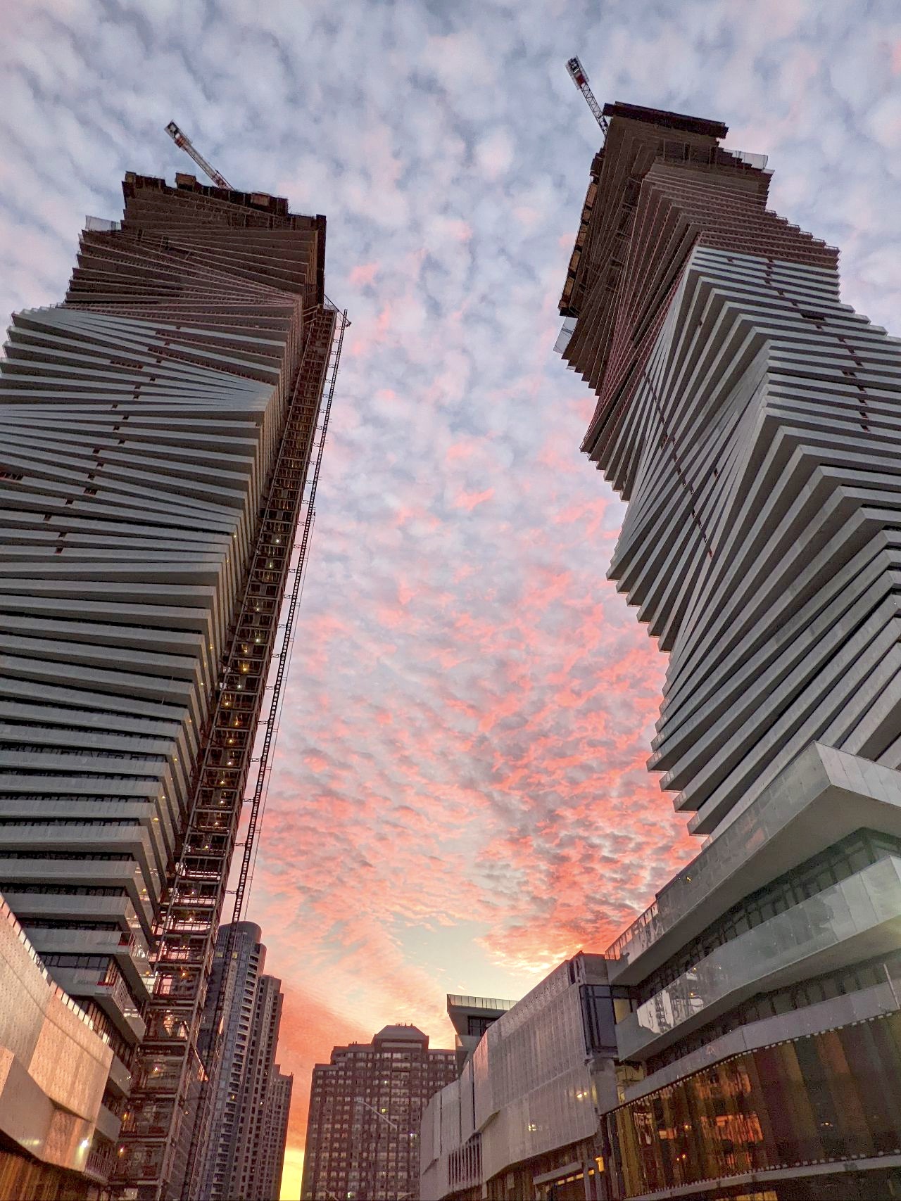 Looking Up At Sunset Through The M1 And M2 Towers At M City In