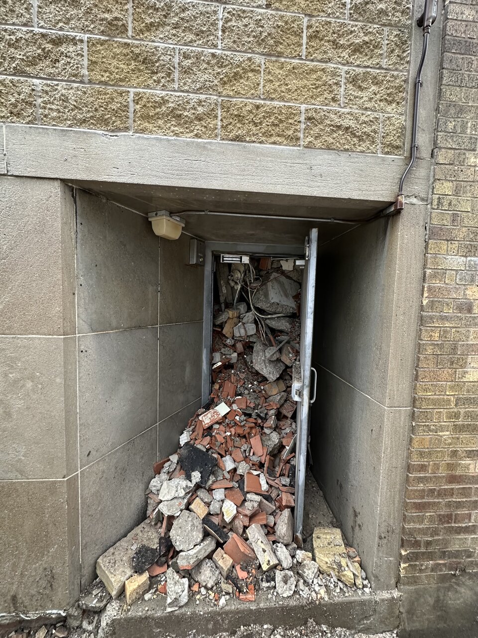 Door Propped Open | UrbanToronto